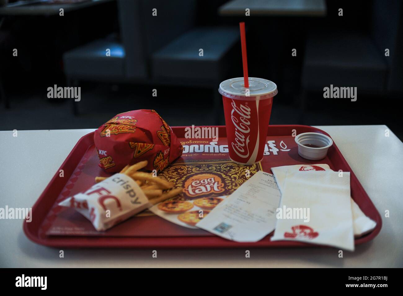 29.10.2015, Yangon, Myanmar, Asia - Tray with Zinger chicken burger ...