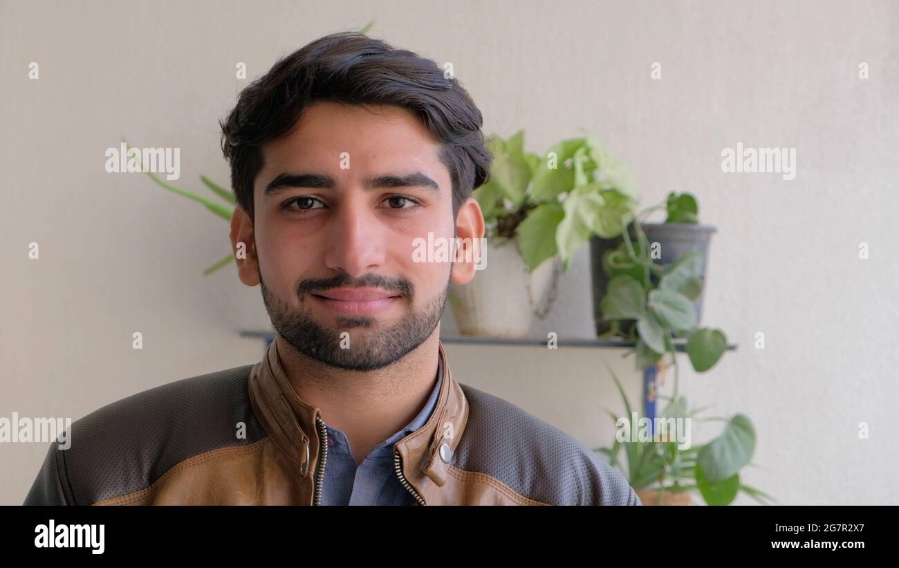 Handsome Indian male looking at the camera with a smiling face Stock ...