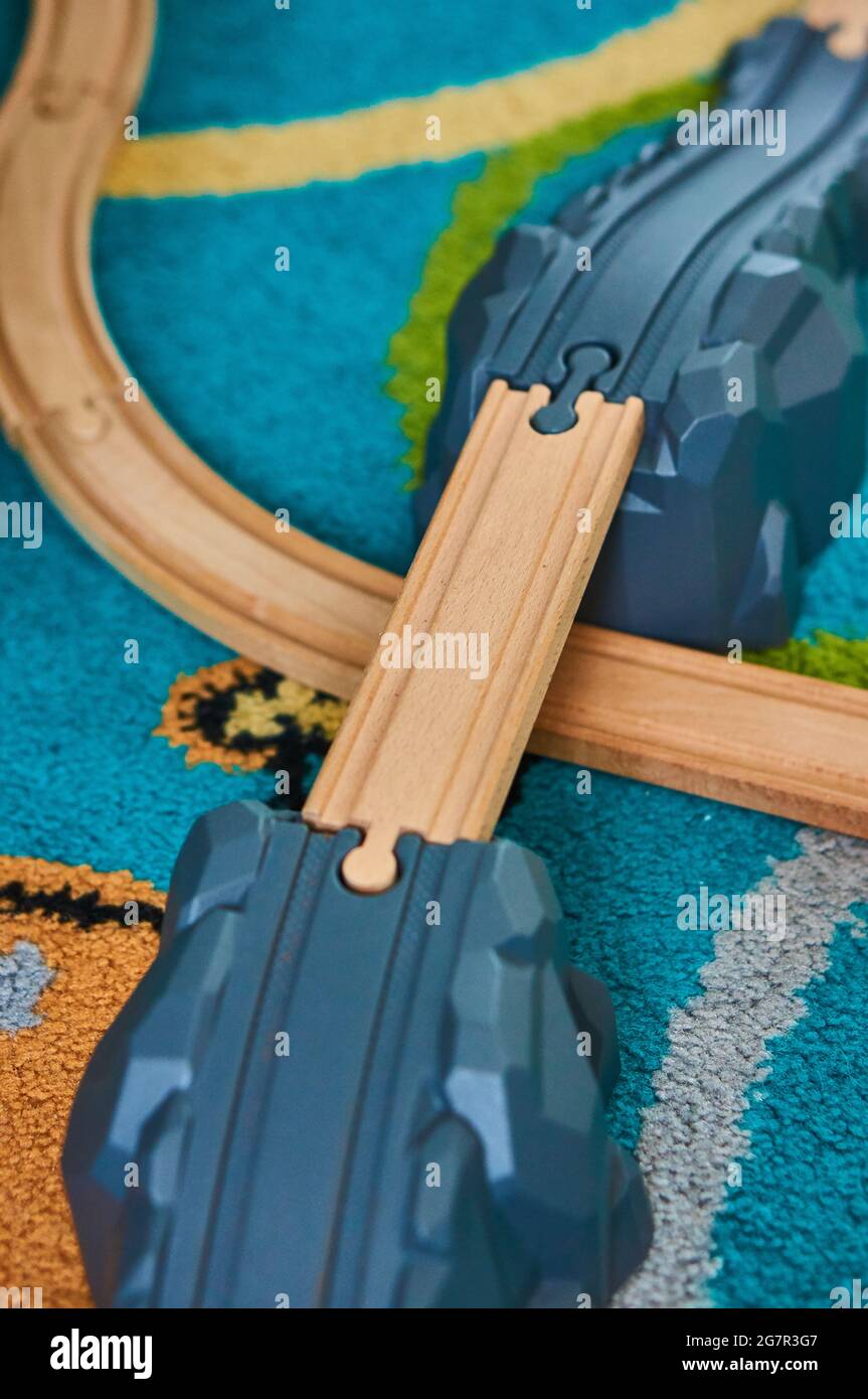 Closeup of a toy railroad crossing on colorful background Stock Photo ...