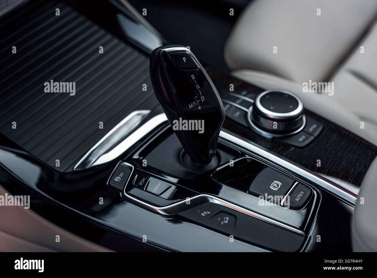 Cockpit interior cabin details. Automatic gear shifter in a modern ...