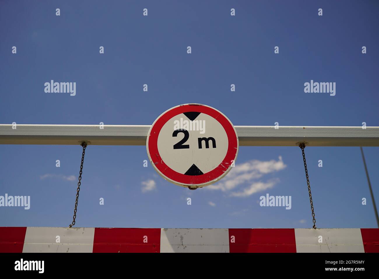 Low angle shot of a "2m height limitation" sign Stock Photo - Alamy
