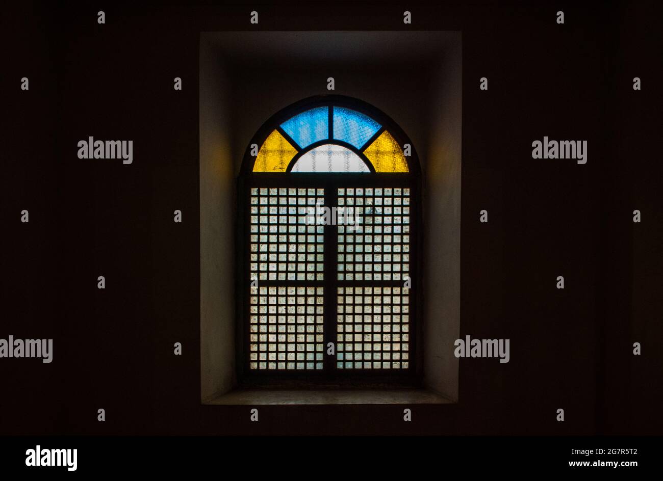 Arched window in a dark room Stock Photo - Alamy