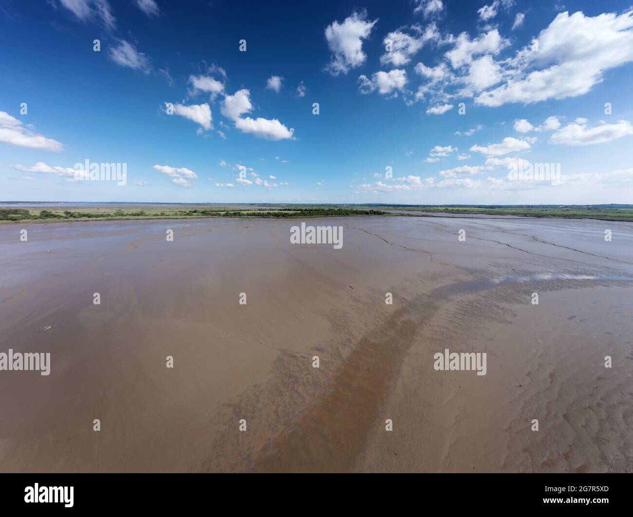 maldon mud banks when the tie is out Stock Photo - Alamy