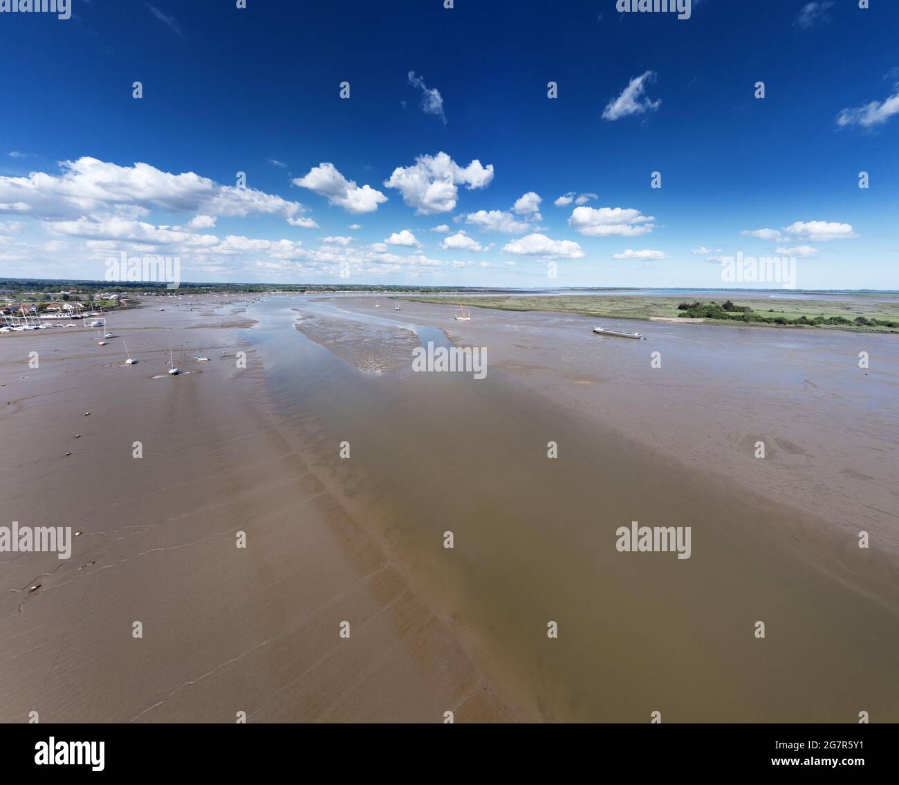 maldon mud banks when the tie is out Stock Photo - Alamy