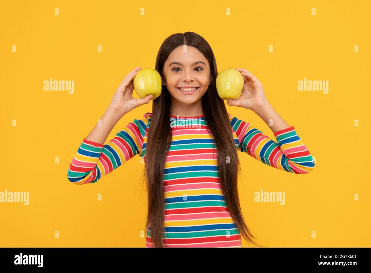 Say hello to a nice smile. Happy child smile holding apples. Healthy ...