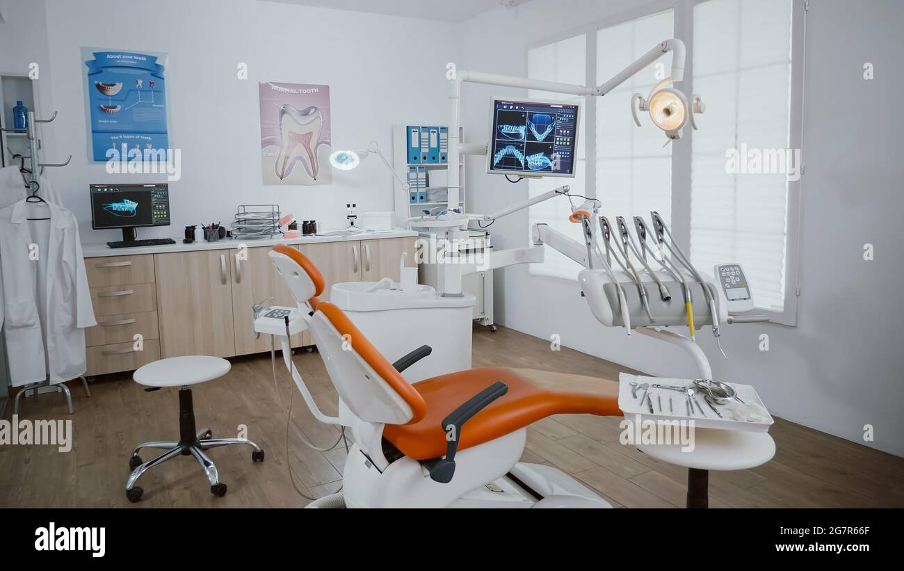 Close up revealing shot of stomatology orthodontic hospital office room ...