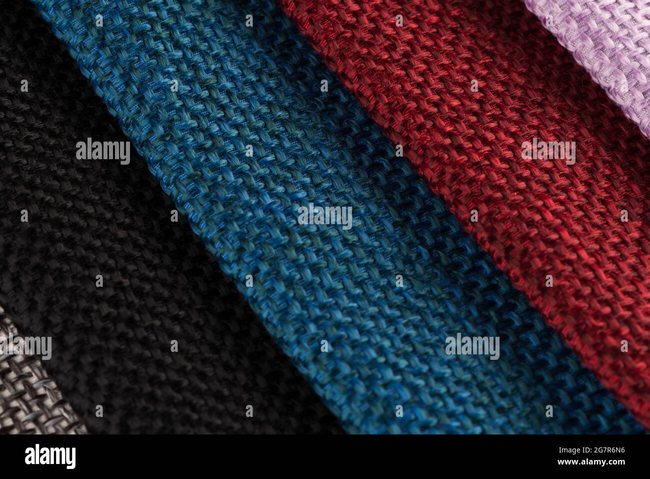 Closeup detail of multi color fabric samples texture background Stock ...