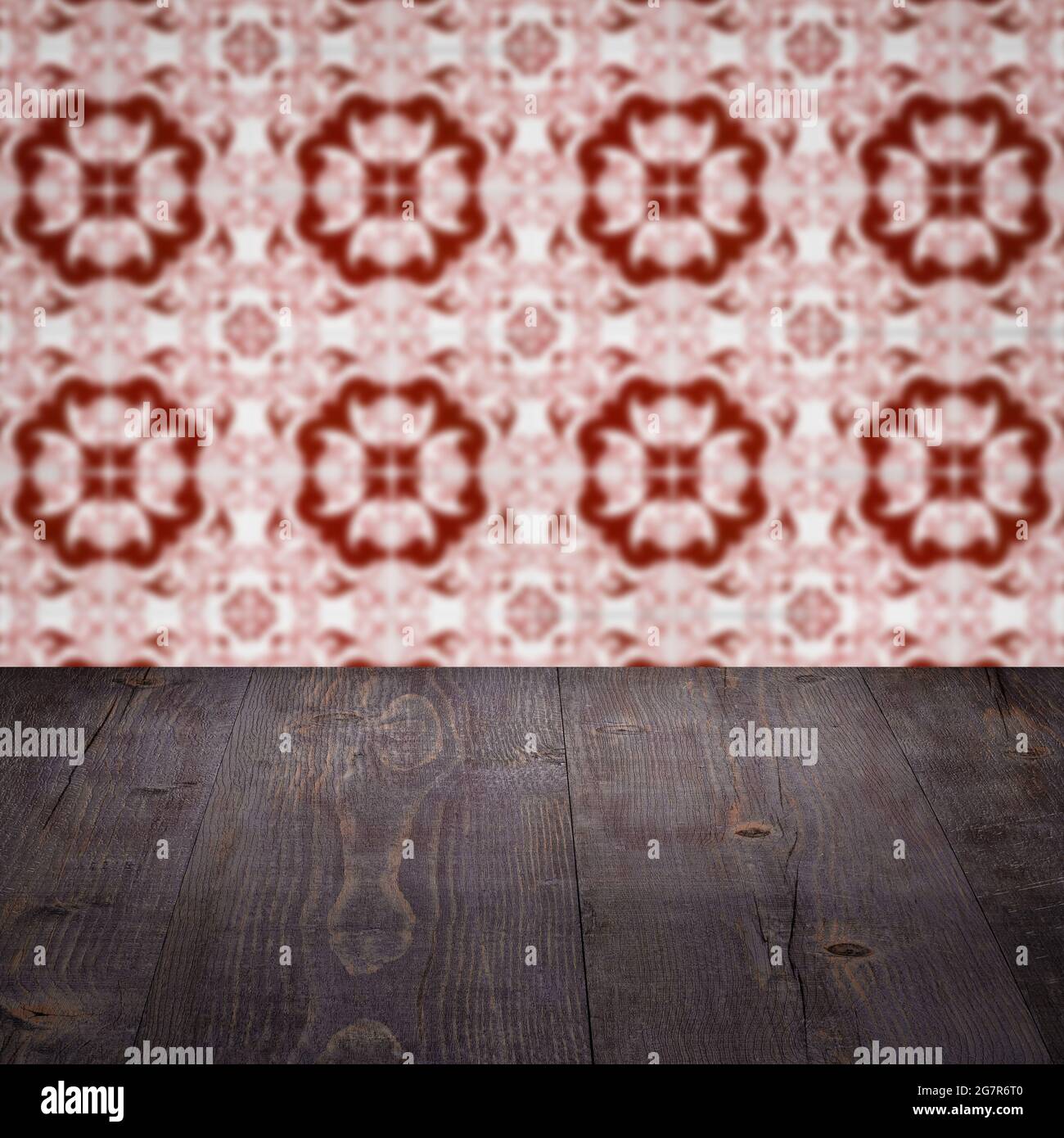 Empty wood table top and blur vintage ceramic tile pattern wall in ...