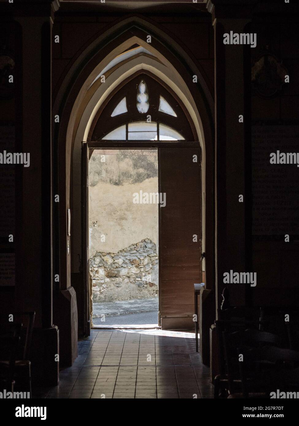 Vertical shot of an open wooden door Stock Photo - Alamy