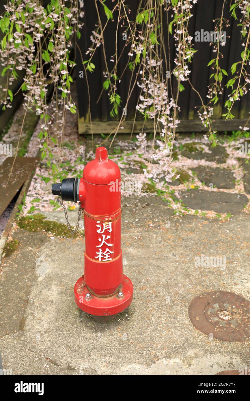 Red fire hydrant on the street near old town of Kakunodate, Japan ...
