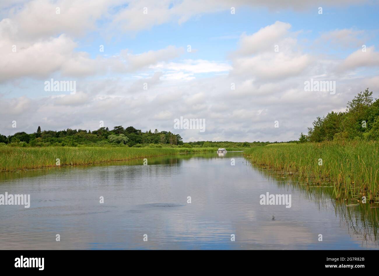 A view of a motor cruiser entering Sutton Broad from the River Ant on ...