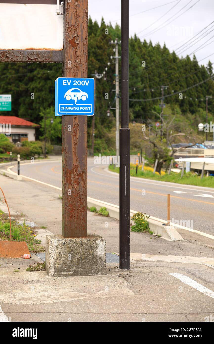 EV charging point sign board at lake inawashiro Fukushima, Japan Stock ...