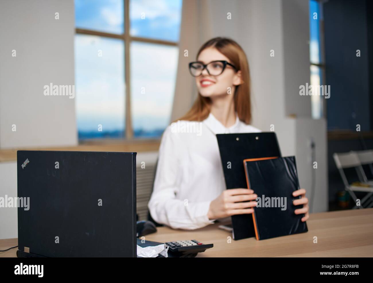 Business woman sitting at her desk documents secretary office work ...