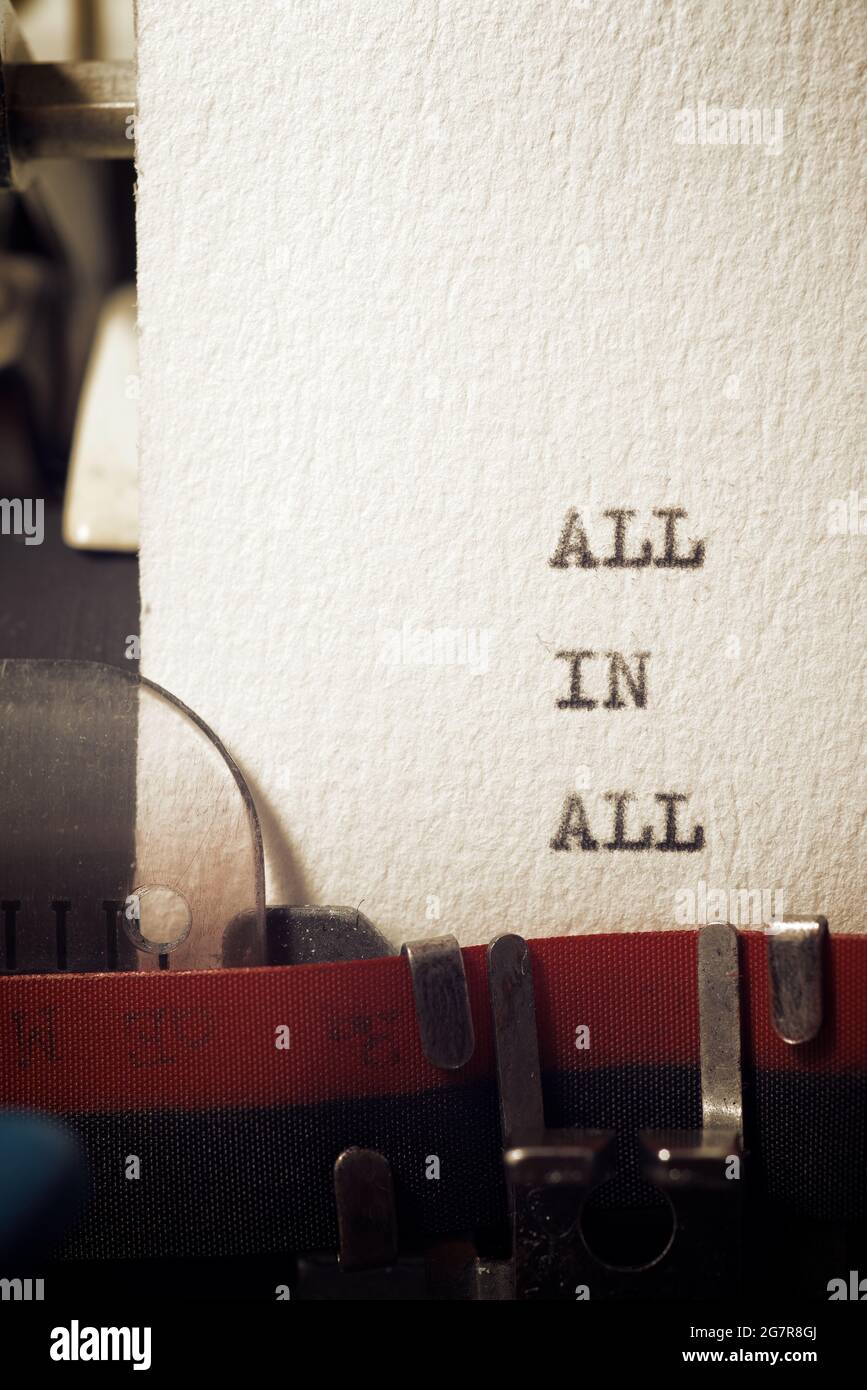 All in all phrase written with a typewriter Stock Photo - Alamy