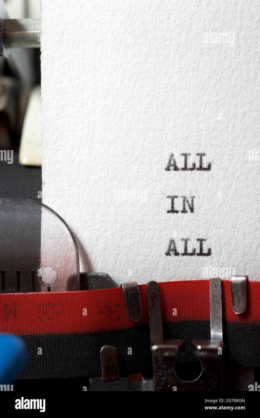All in all phrase written with a typewriter Stock Photo - Alamy
