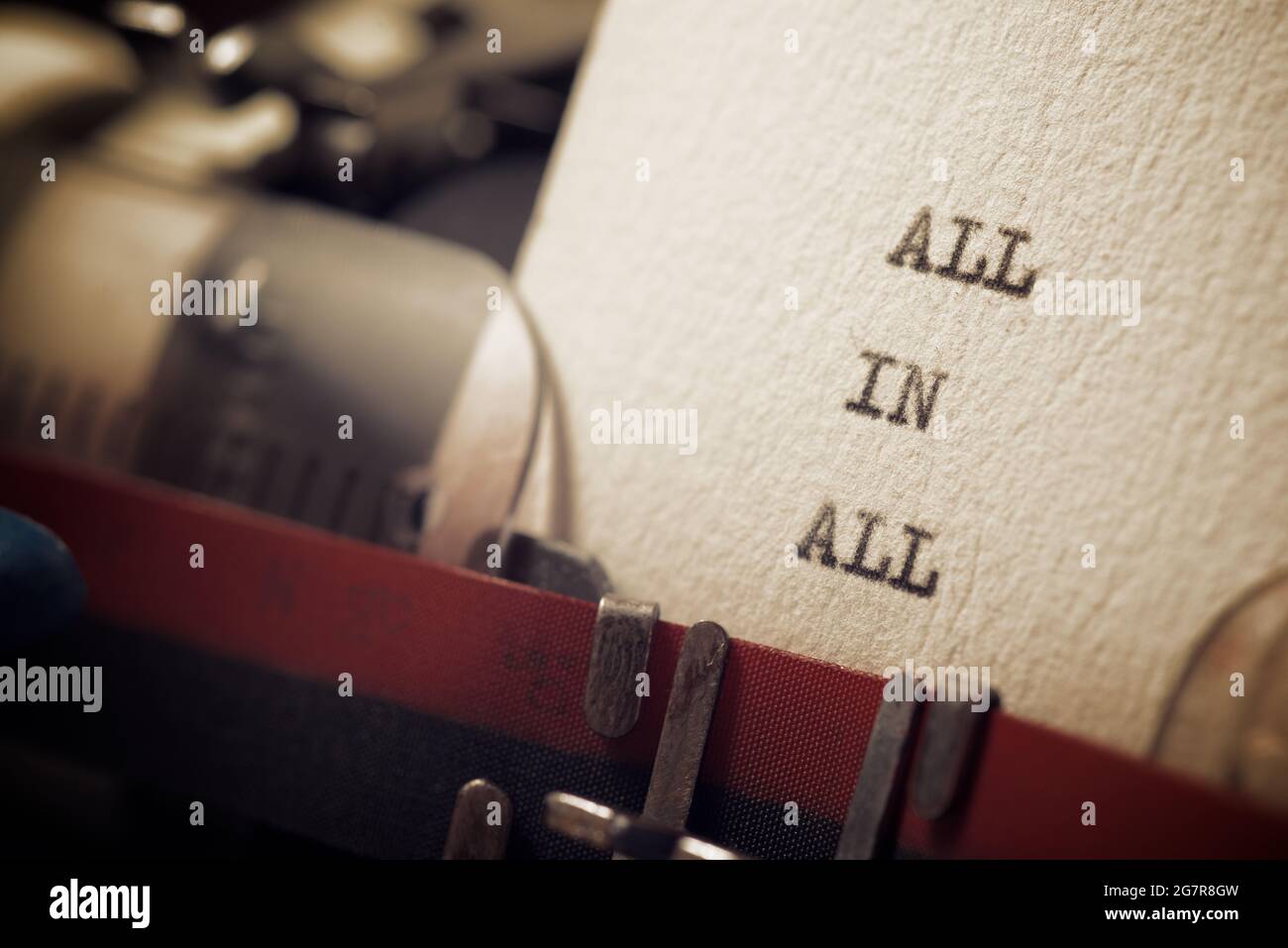 All in all phrase written with a typewriter Stock Photo - Alamy