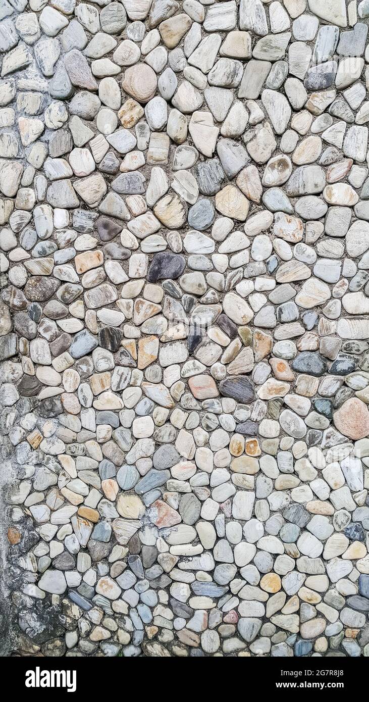 Old river rock wall texture background Stock Photo - Alamy