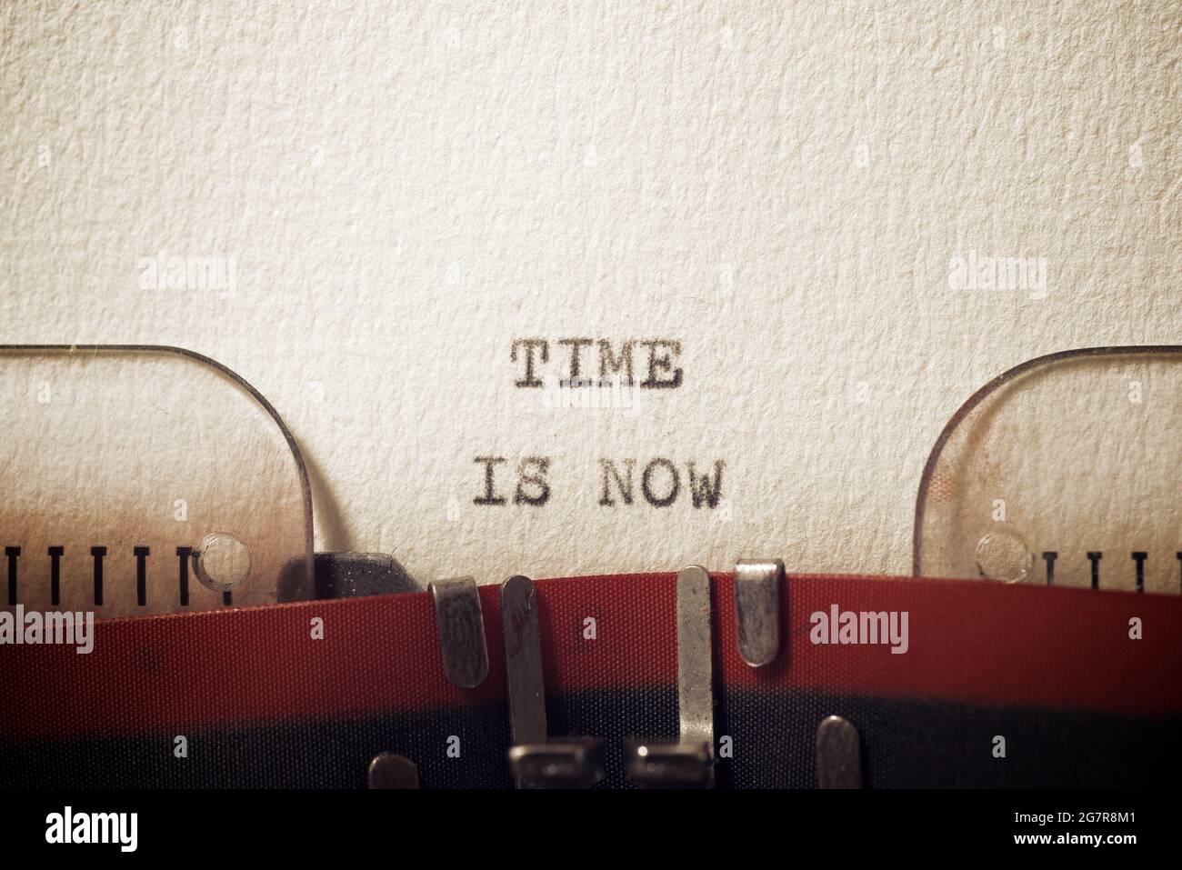 Time is now phrase written with a typewriter Stock Photo - Alamy