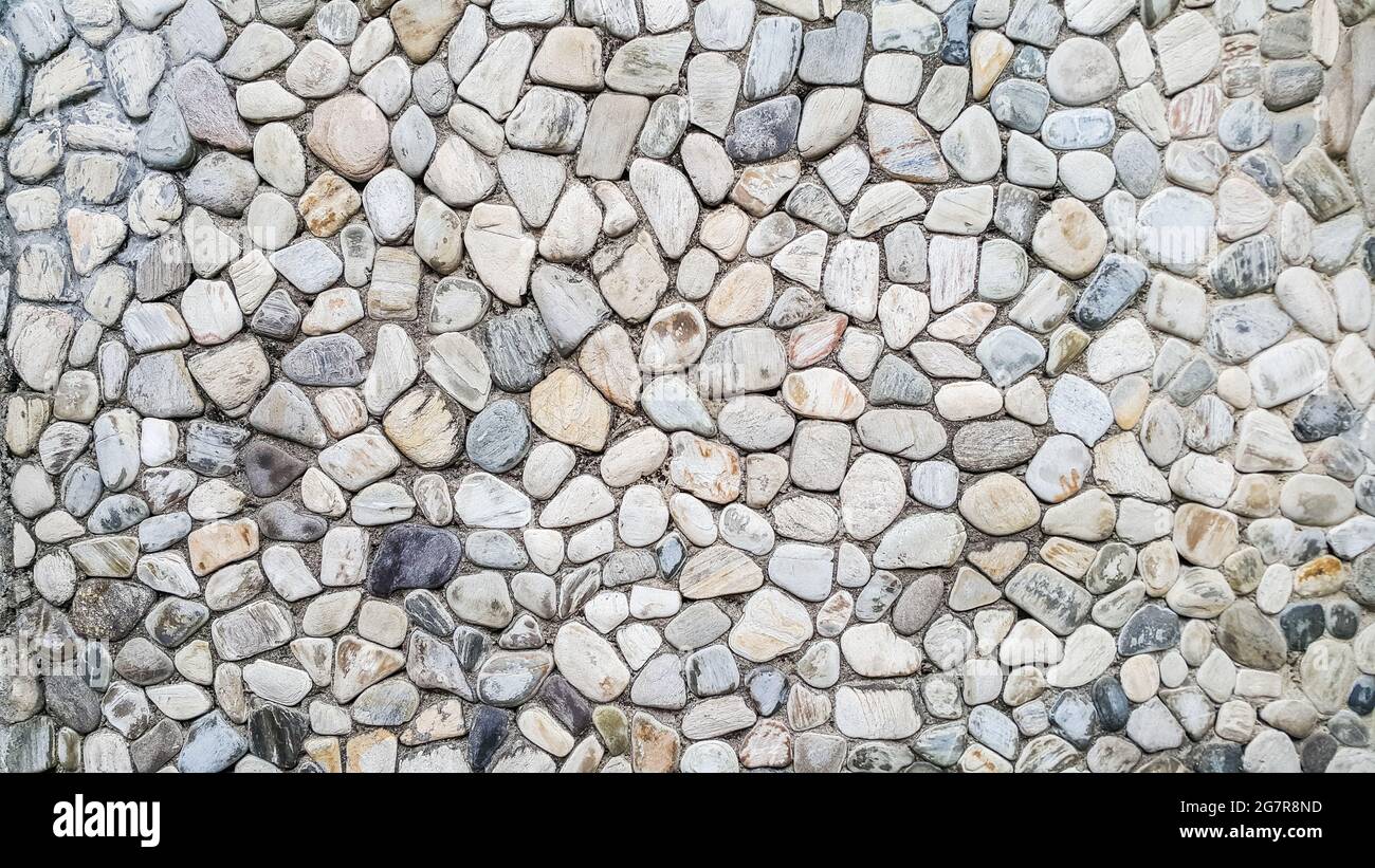 river rock wall texture background Stock Photo - Alamy