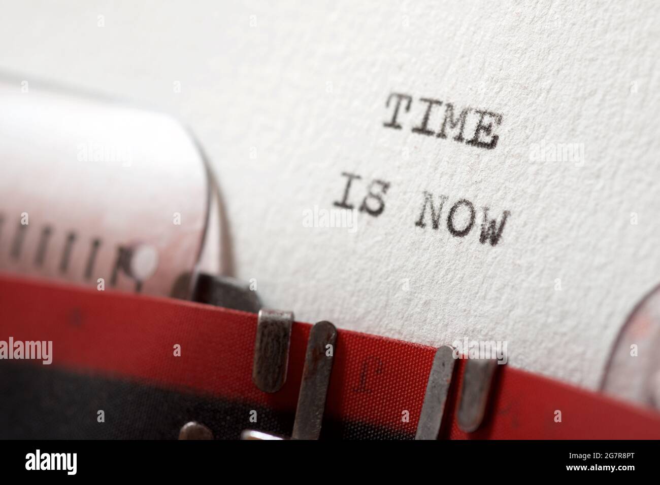 Time is now phrase written with a typewriter Stock Photo - Alamy