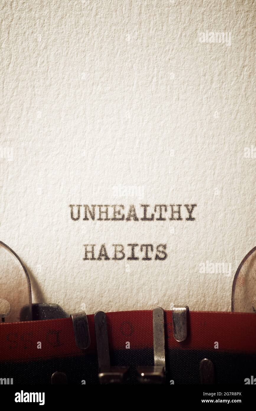 Unhealthy habits phrase written with a typewriter Stock Photo - Alamy