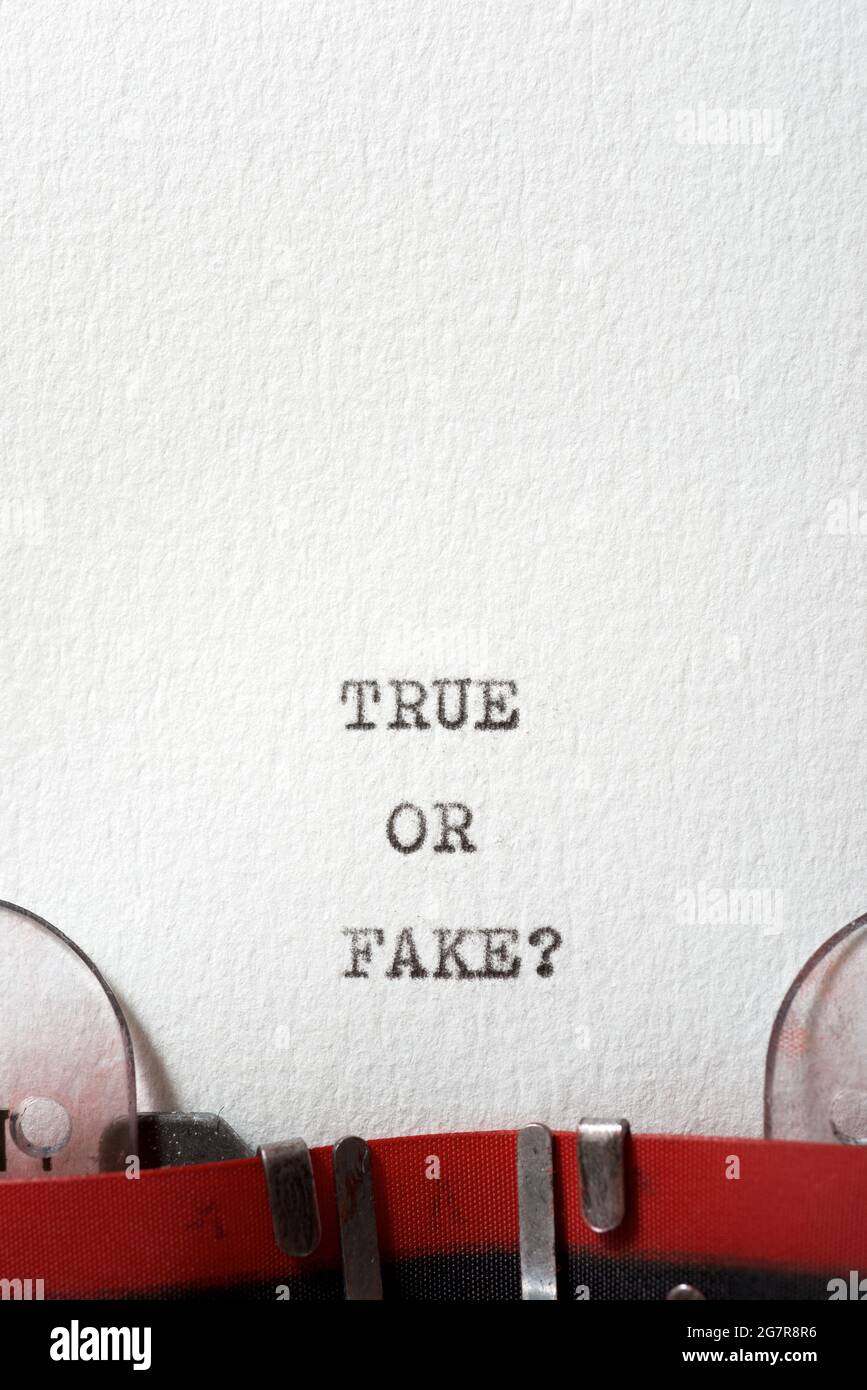 True or fake? phrase written with a typewriter Stock Photo - Alamy
