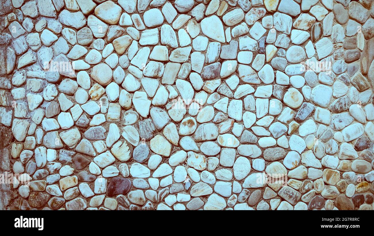 Old river rock wall texture background Stock Photo - Alamy