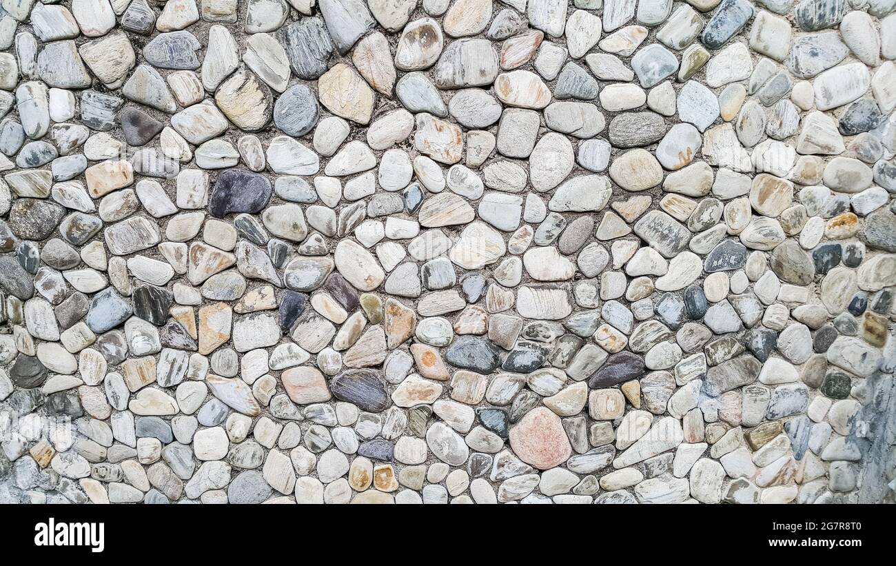 river rock wall texture background Stock Photo - Alamy