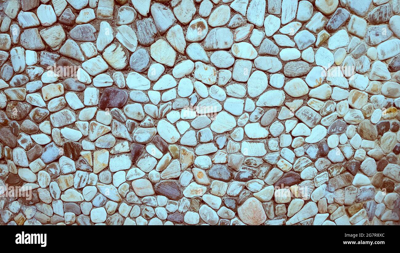 Old river rock wall texture background Stock Photo - Alamy