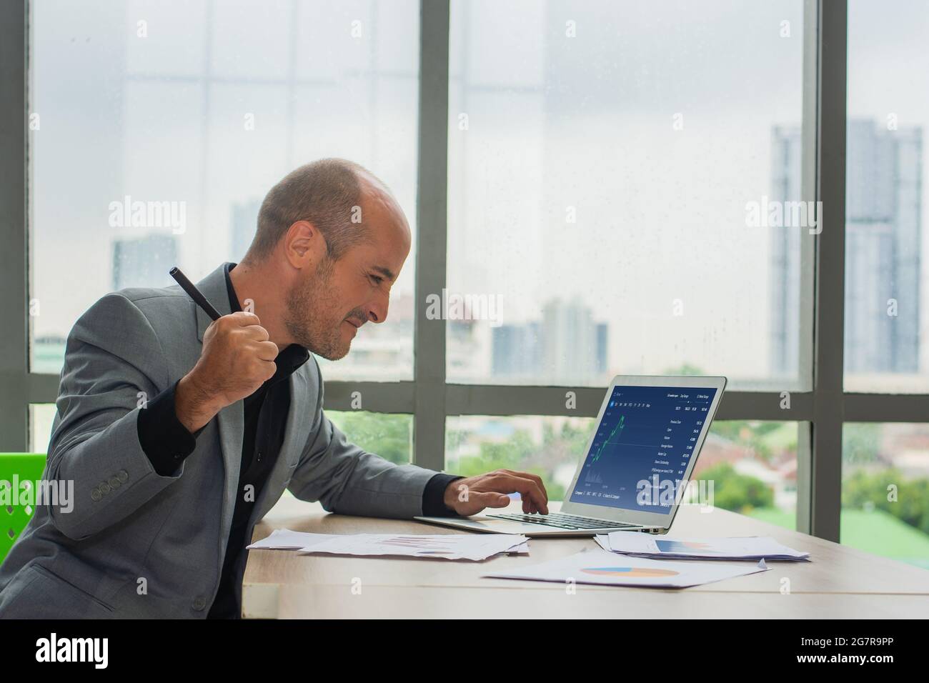 Businessman success trading online with digital graph market growth ...