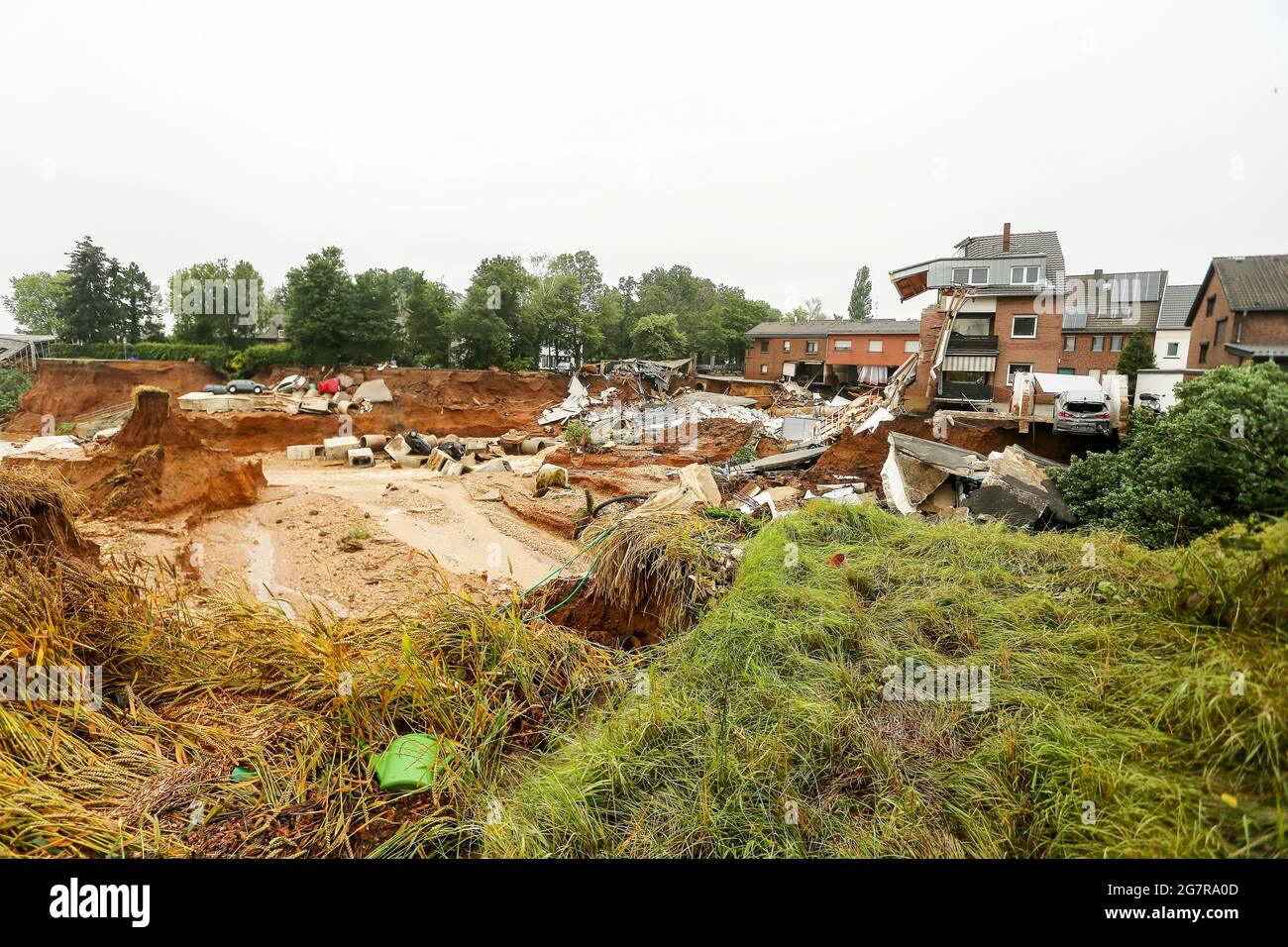 Erftstadt, Germany. 16th July, 2021. Debris of collapsed houses lie in ...