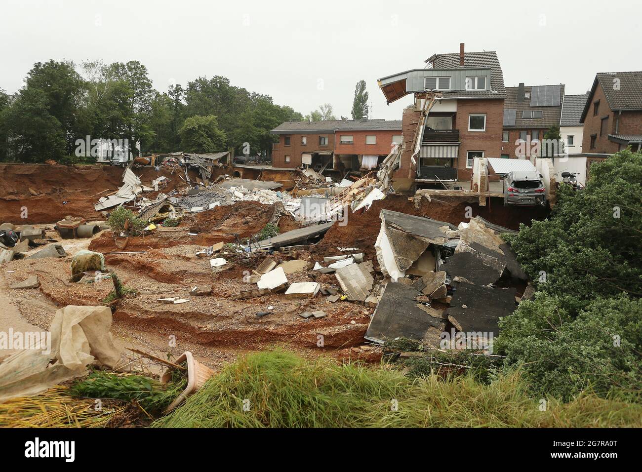 Erftstadt, Germany. 16th July, 2021. Debris of collapsed houses lie in ...