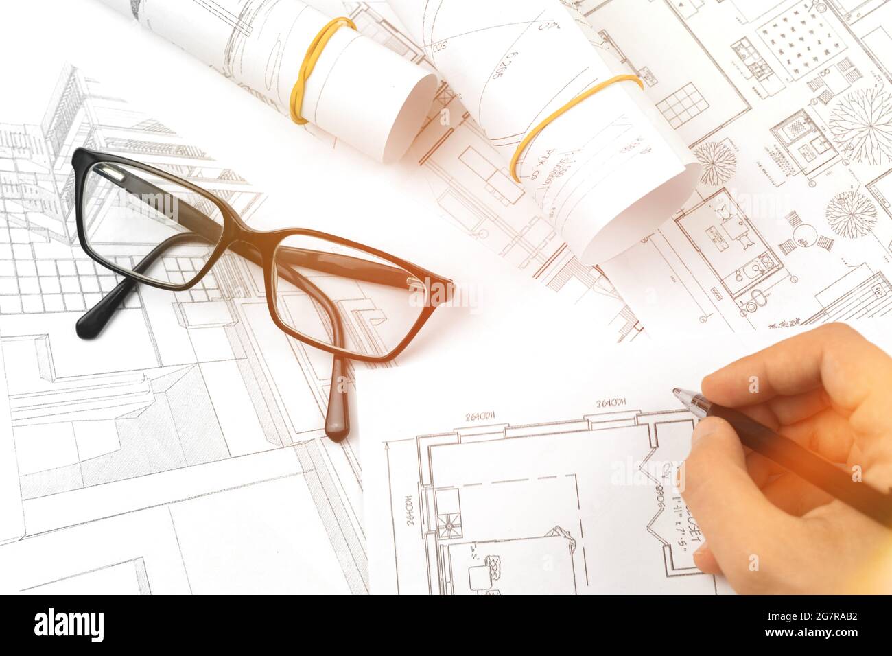 Man drawing the blueprints, architecture and engineering business ...