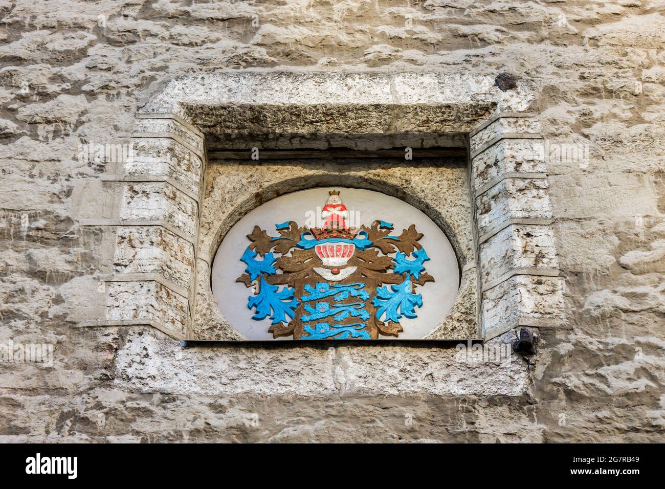 Tallinn, Estonia. Emblem or coat of arms of Tallinn in the facade of ...