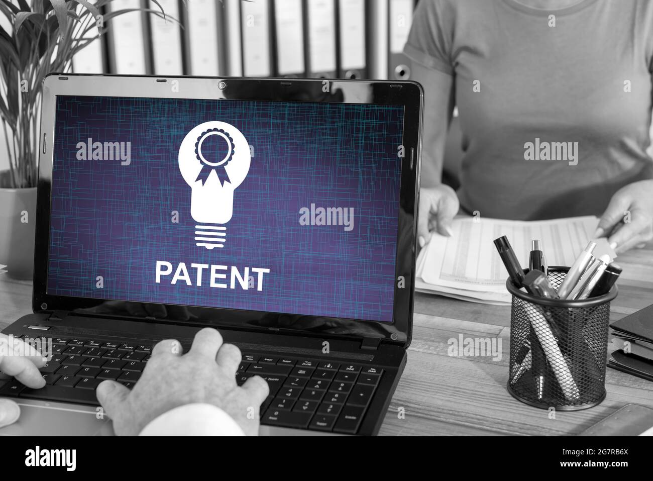 Laptop screen with patent concept Stock Photo - Alamy