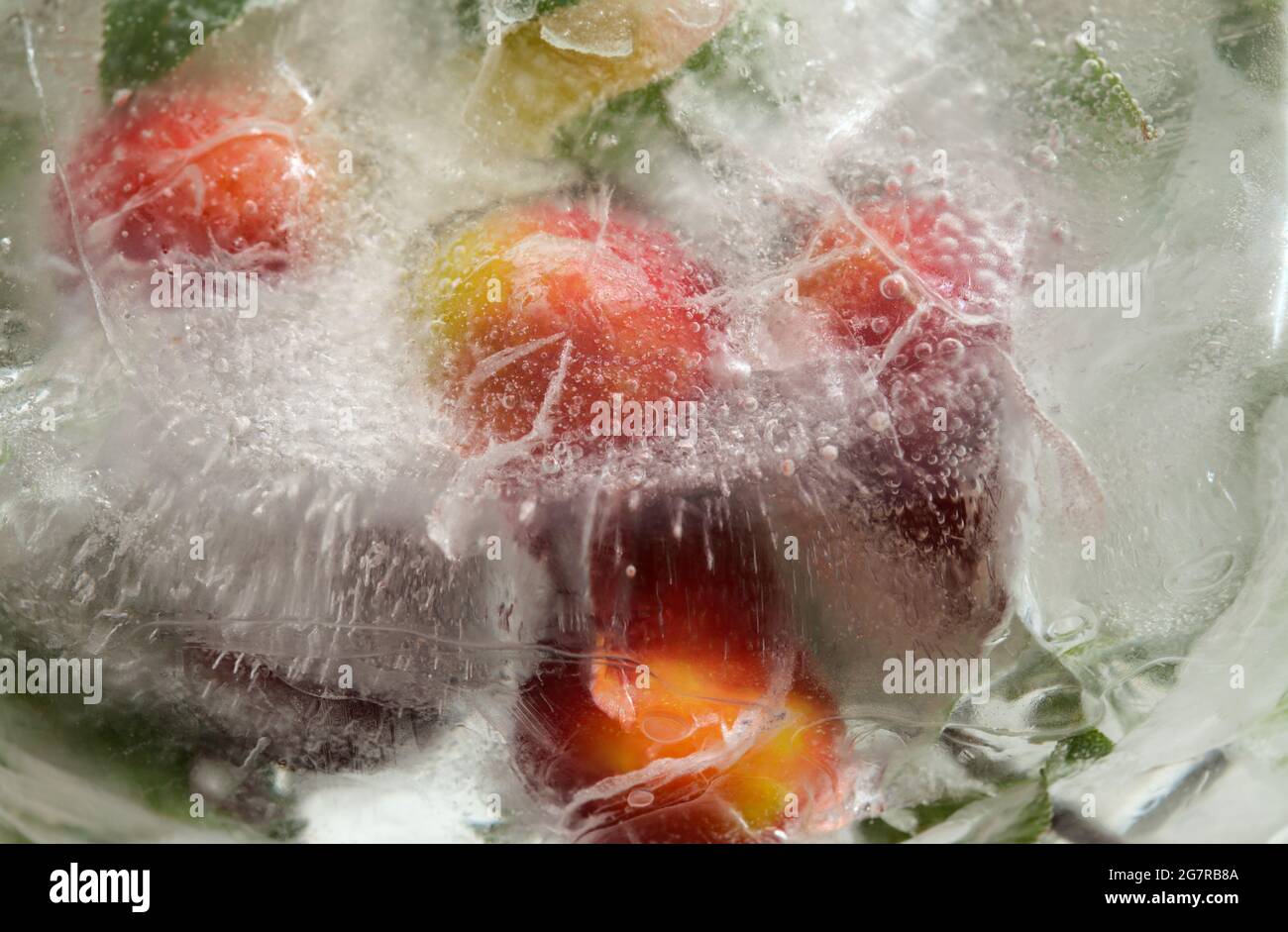 Ice texture with small round plums inside the layer of ice Stock Photo ...