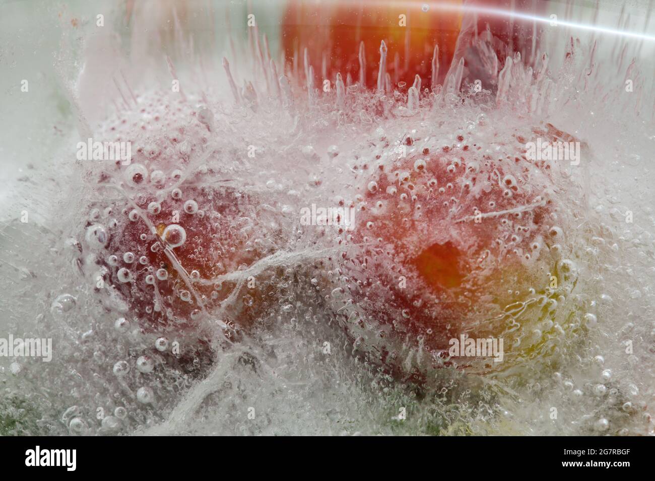Ice texture with small round plums inside the layer of ice Stock Photo ...