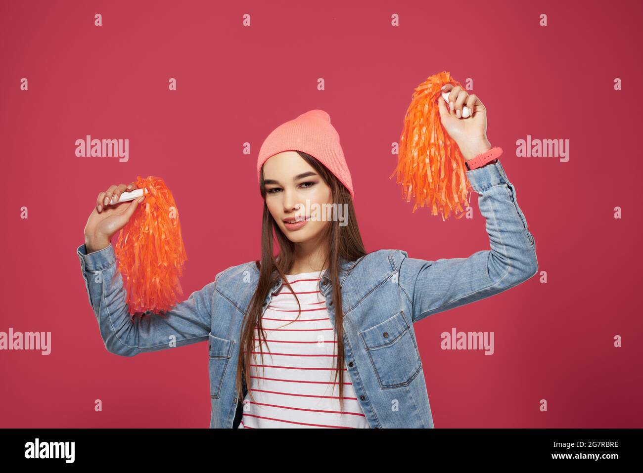 cute brunette wearing pink hat cheerleading dance victory Stock Photo ...