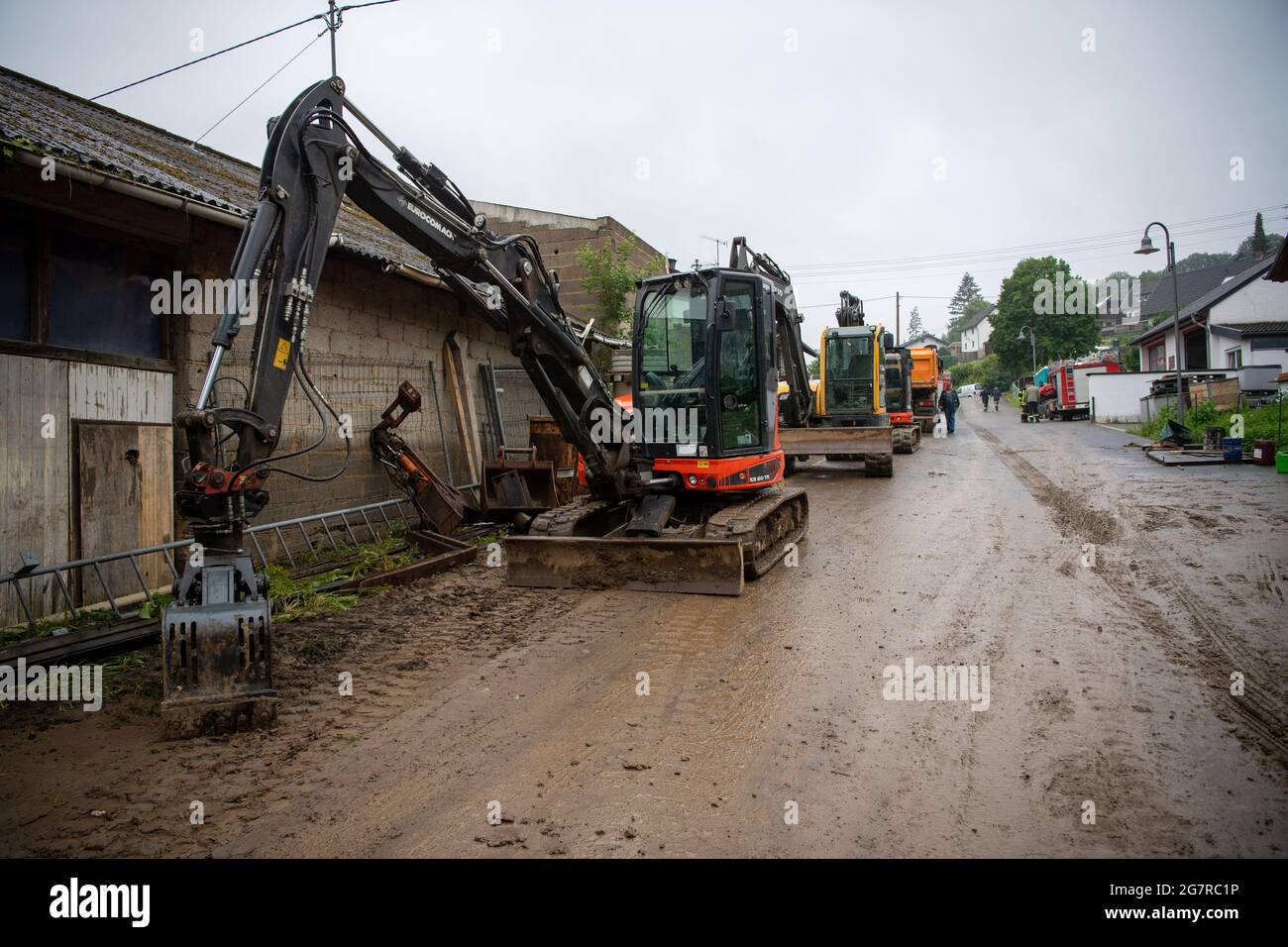 Schuld, Germany. 16th July, 2021. Excavators stand in the centre of ...
