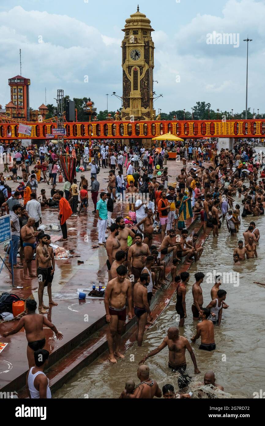 Haridwar, India - July 2021: Pilgrims bathing in the Ganges River at ...