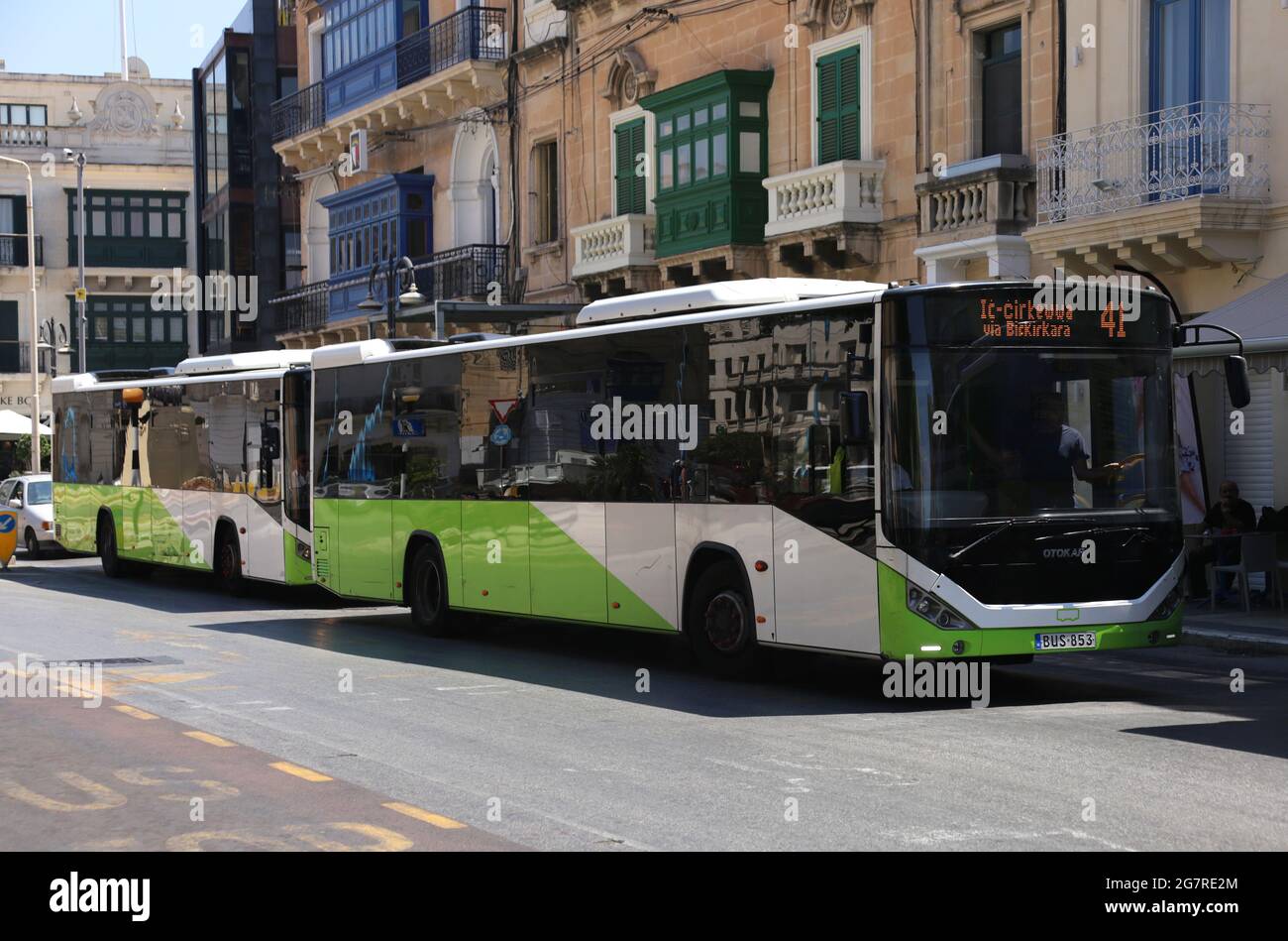 Mosta. Malta. A row of Green and white Public Transport buses at the ...