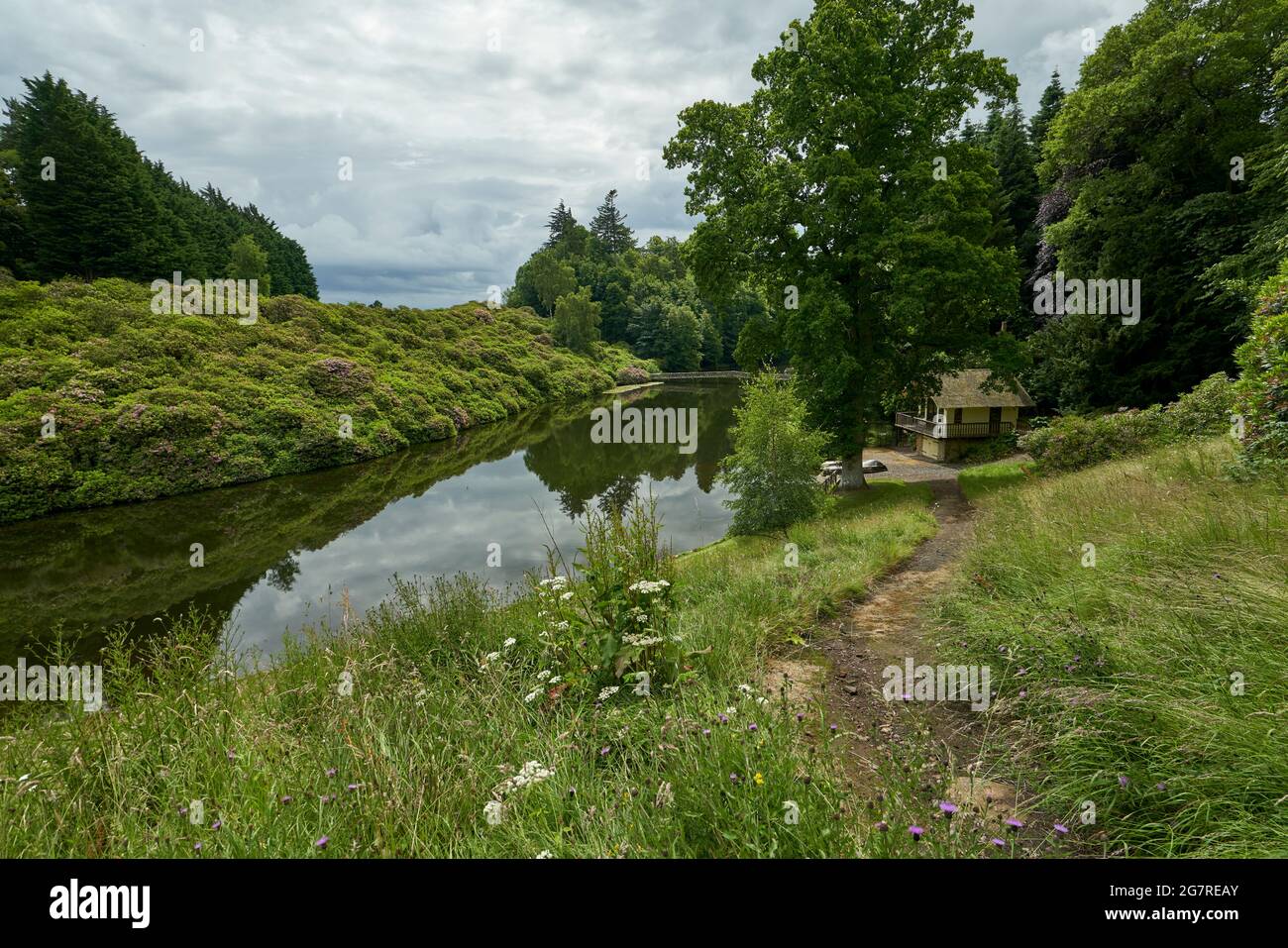 View of the Swiss style boathouse and lake at Manderston House in the ...