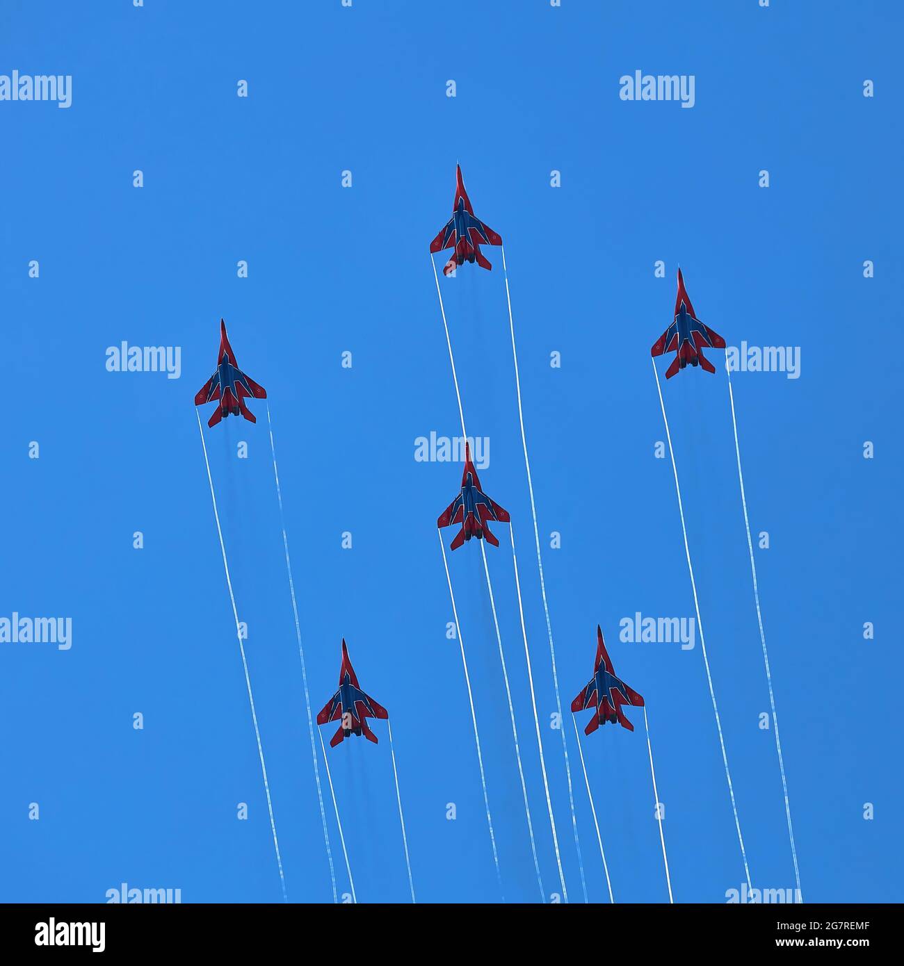 Airshow of the aerobatic team Strizhi - The Swifts. Aerobatic Team on ...