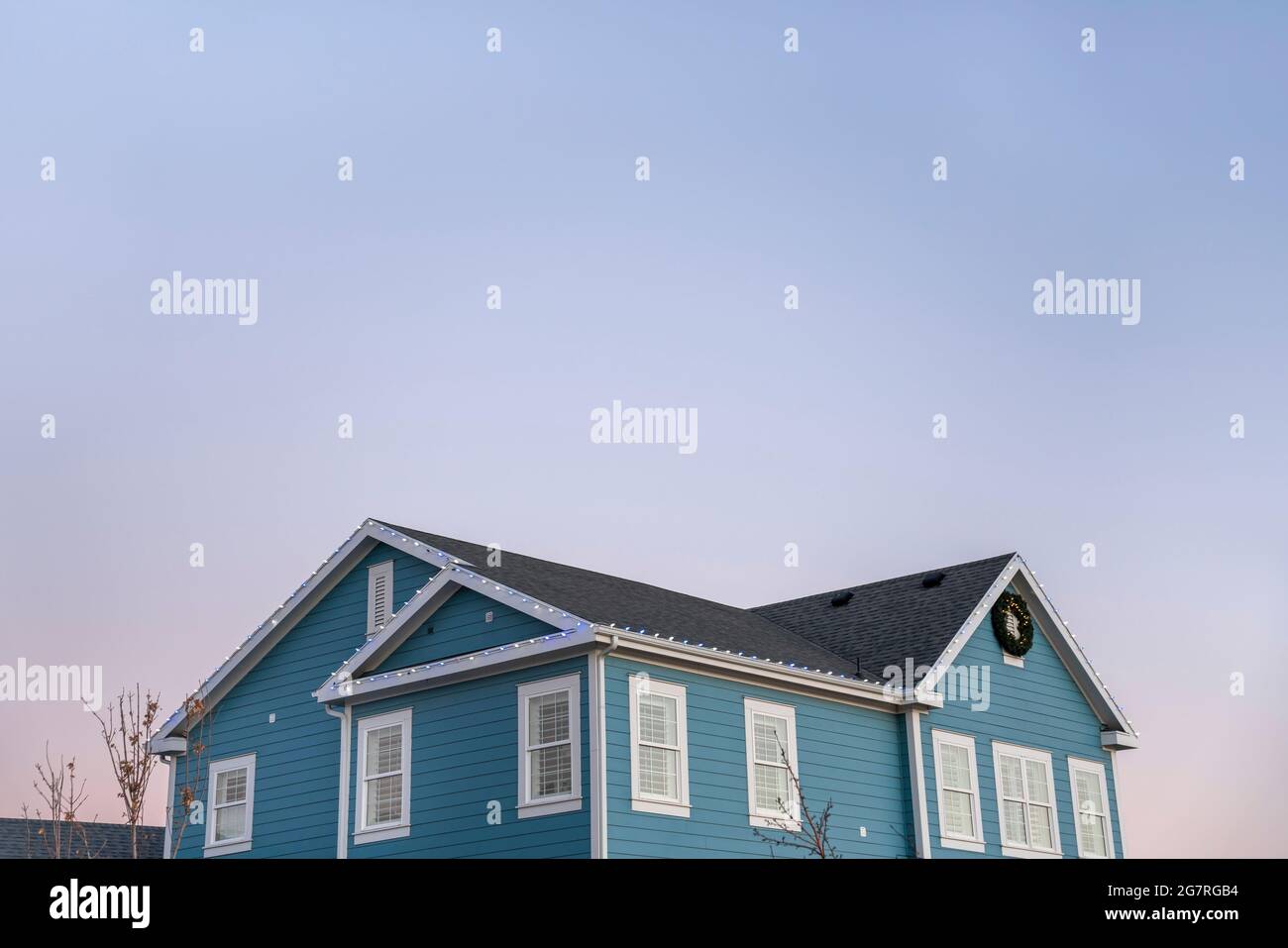 Low angle view of a traditional two-storey house exterior Stock Photo ...