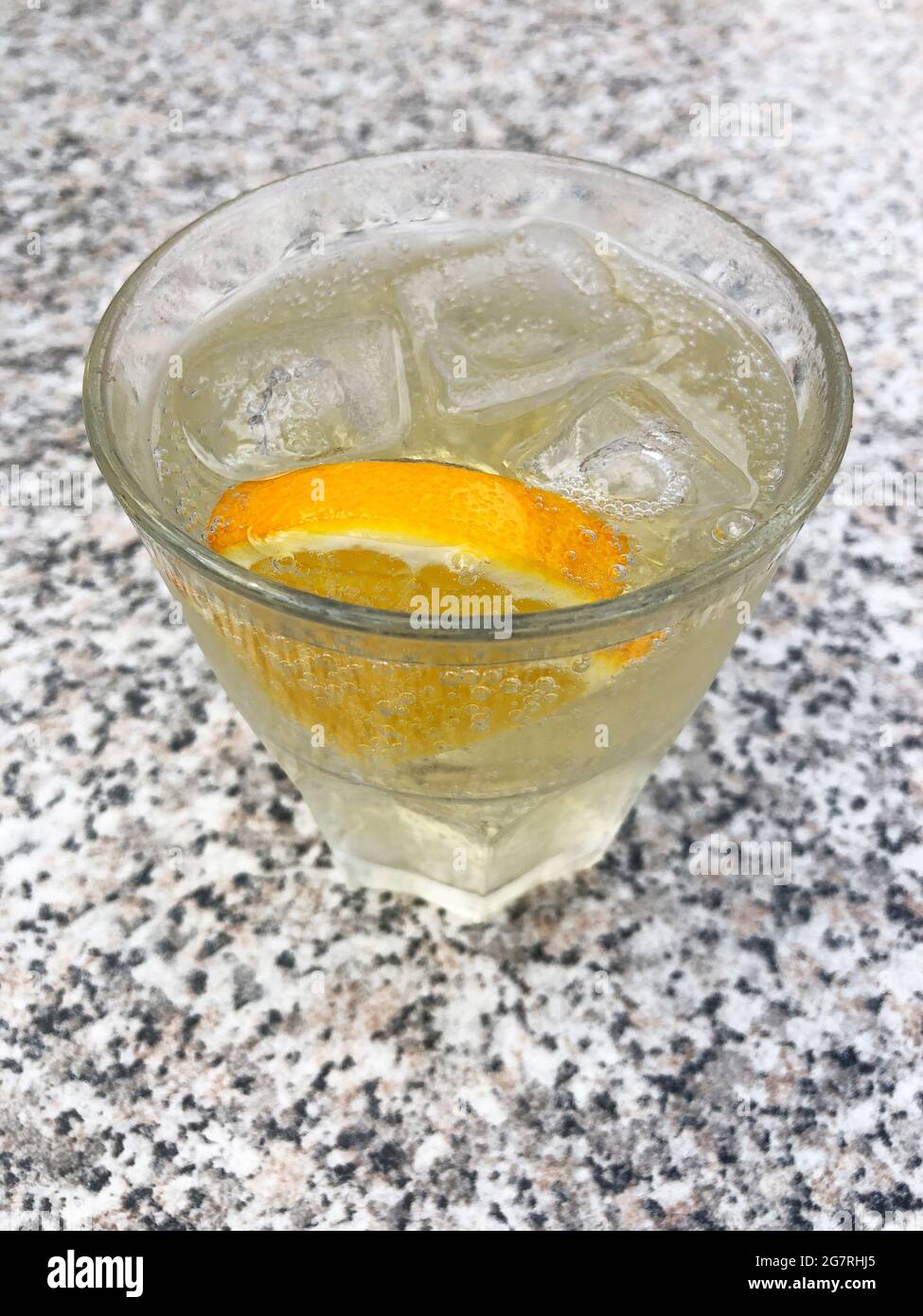 glass of ginger ale with ice cubes Stock Photo - Alamy