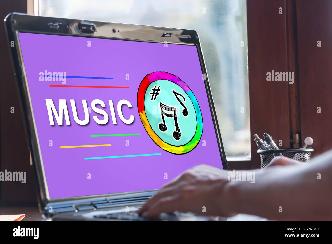 Laptop screen displaying an online music concept Stock Photo - Alamy
