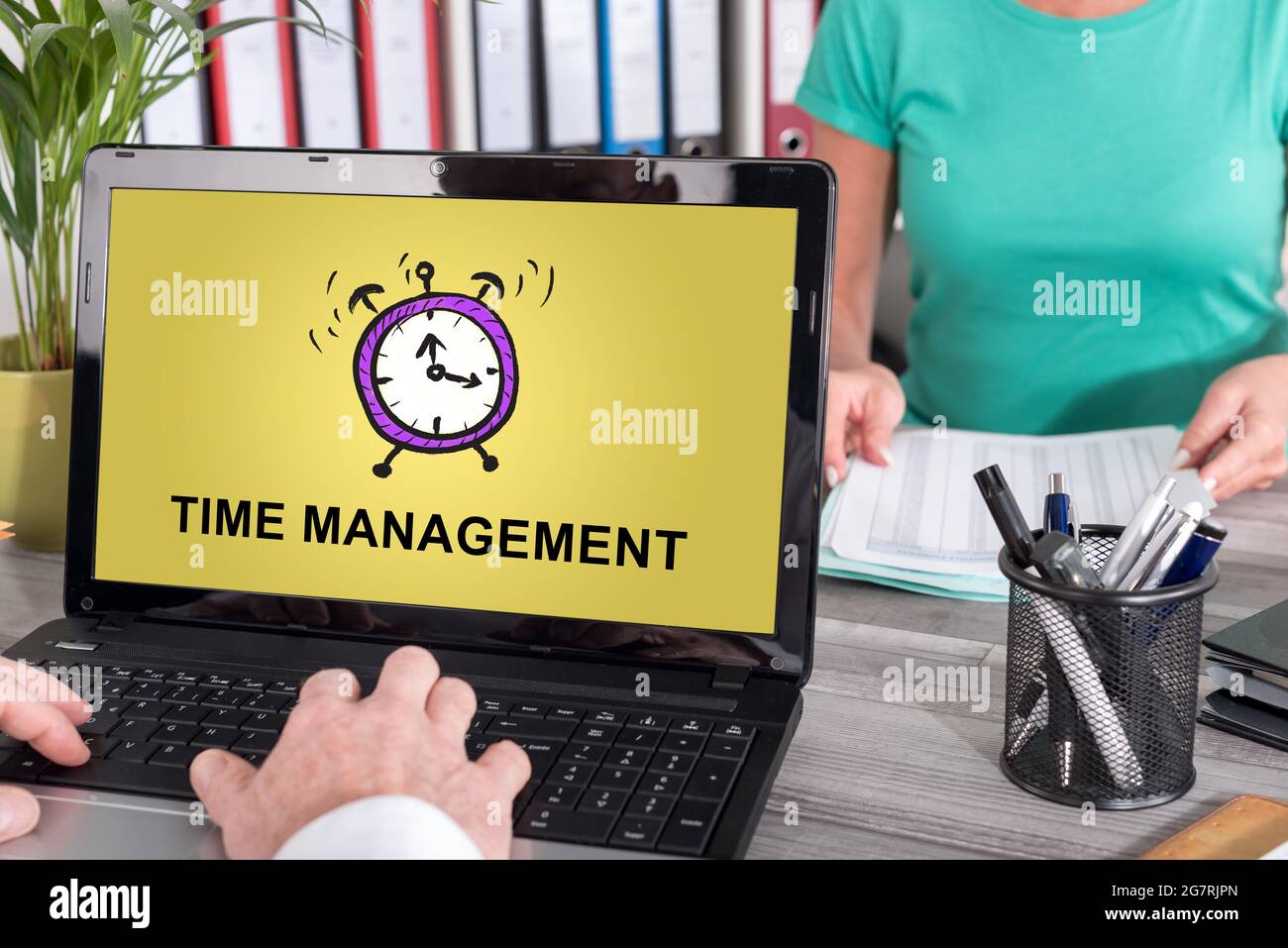 Laptop screen with time management concept Stock Photo - Alamy