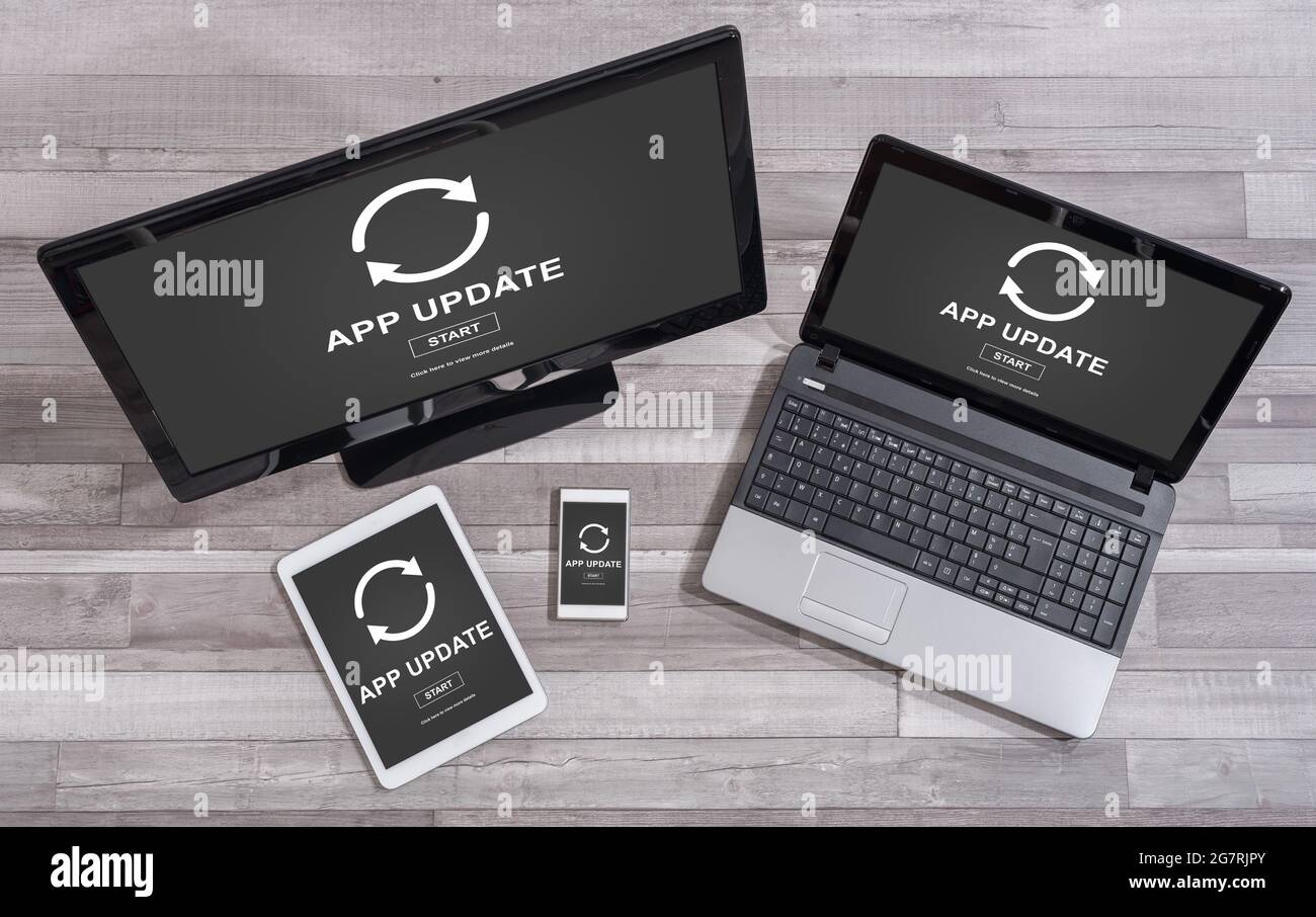 Application update concept shown on different information technology ...
