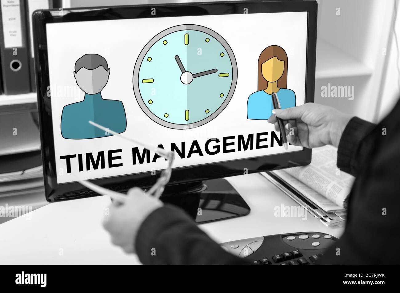 Businesswoman showing time management concept on a computer screen ...