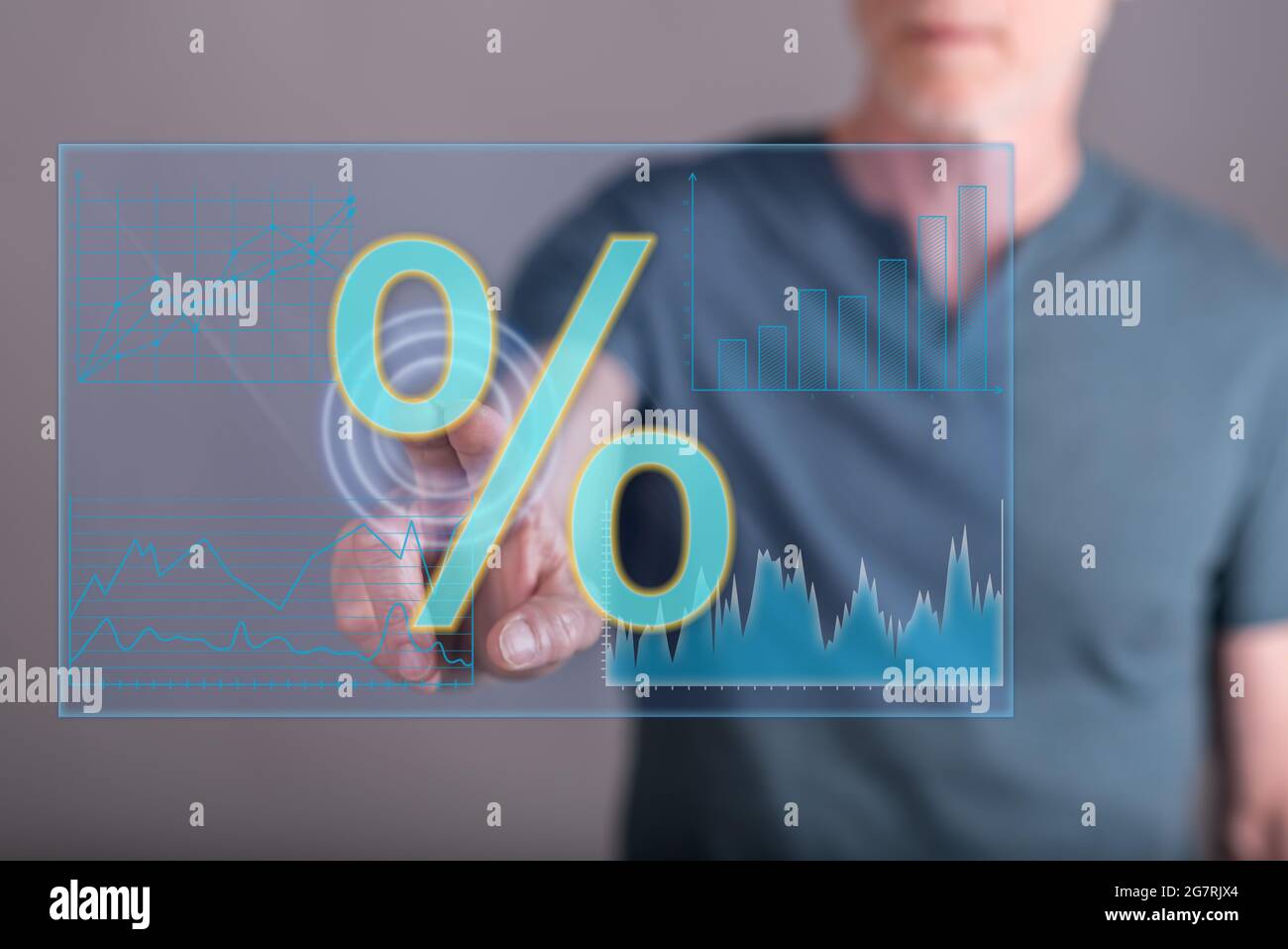 Man touching digital interest rates data on a touch screen with his ...
